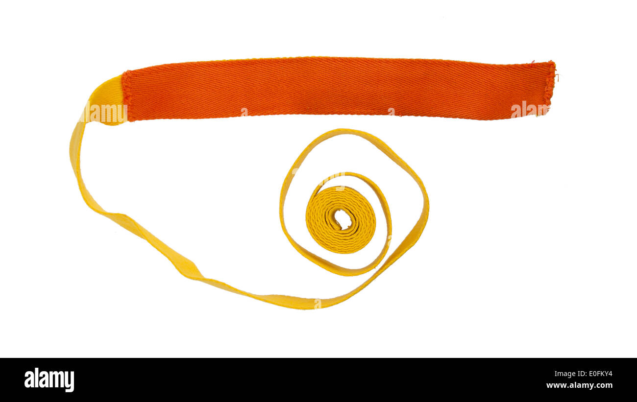 Yellow belt isolated on a white background Stock Photo - Alamy