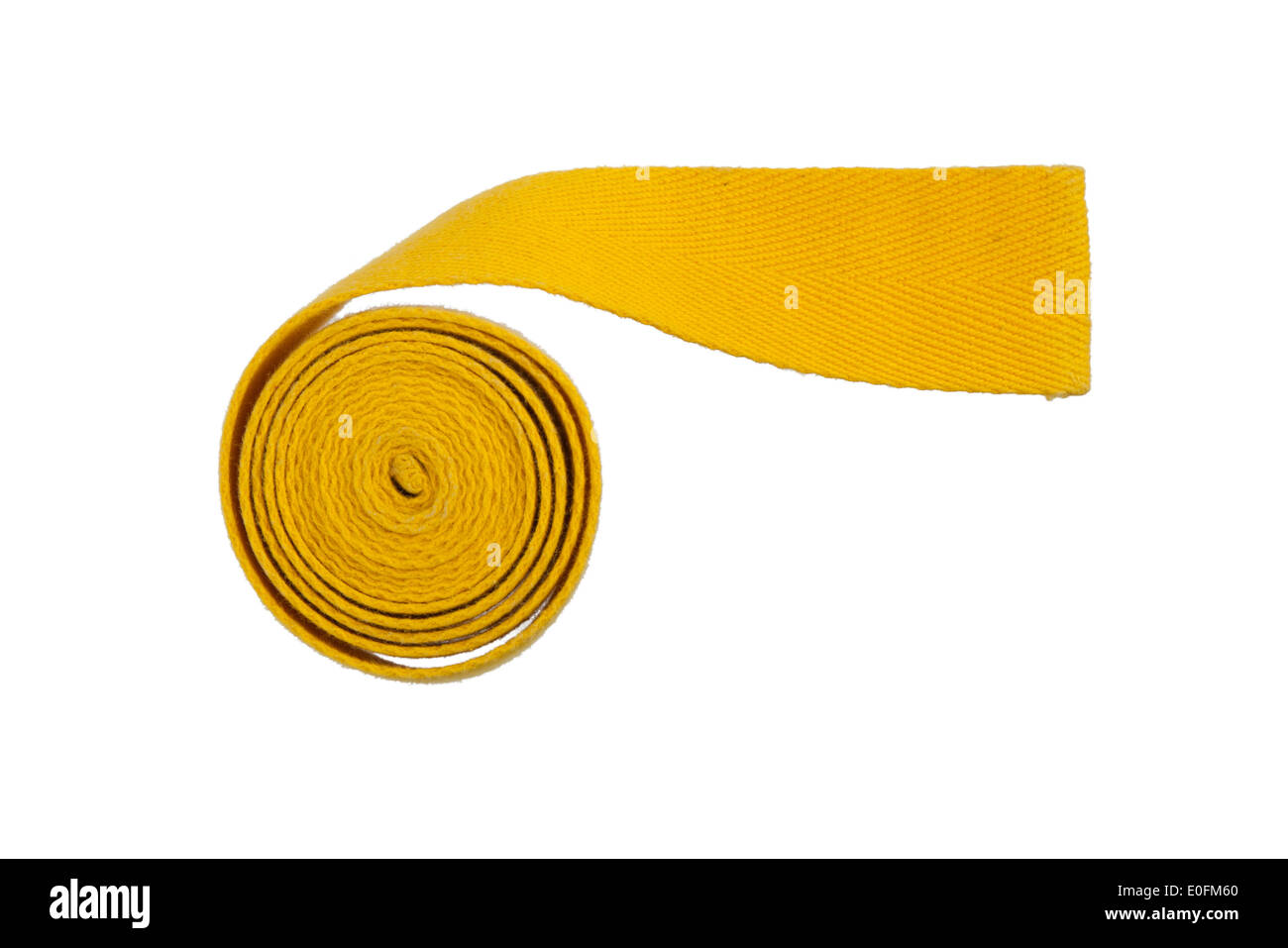 Yellow belt isolated on a white background Stock Photo - Alamy