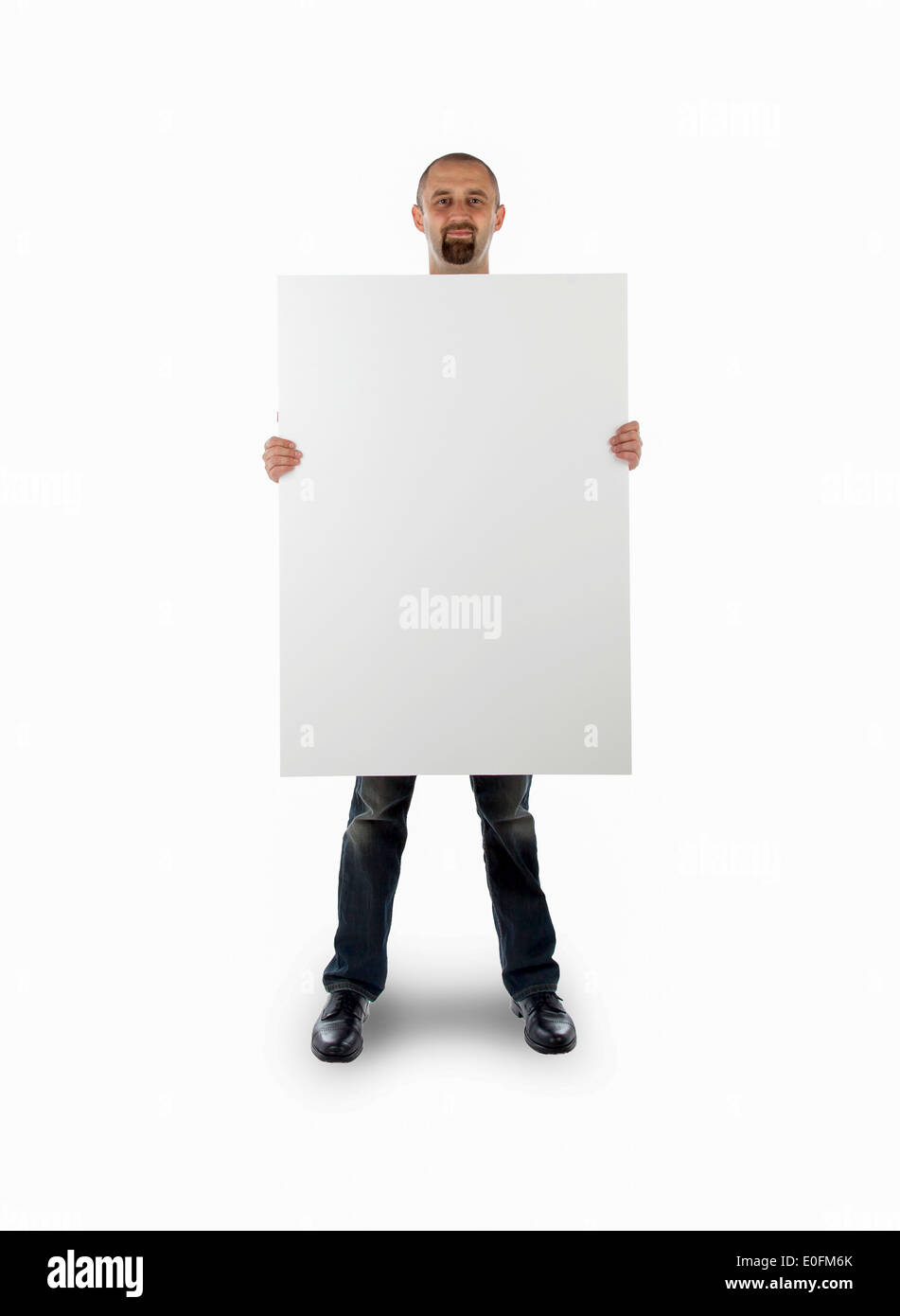 Businessman with empty board in his hands isolated on white background ...