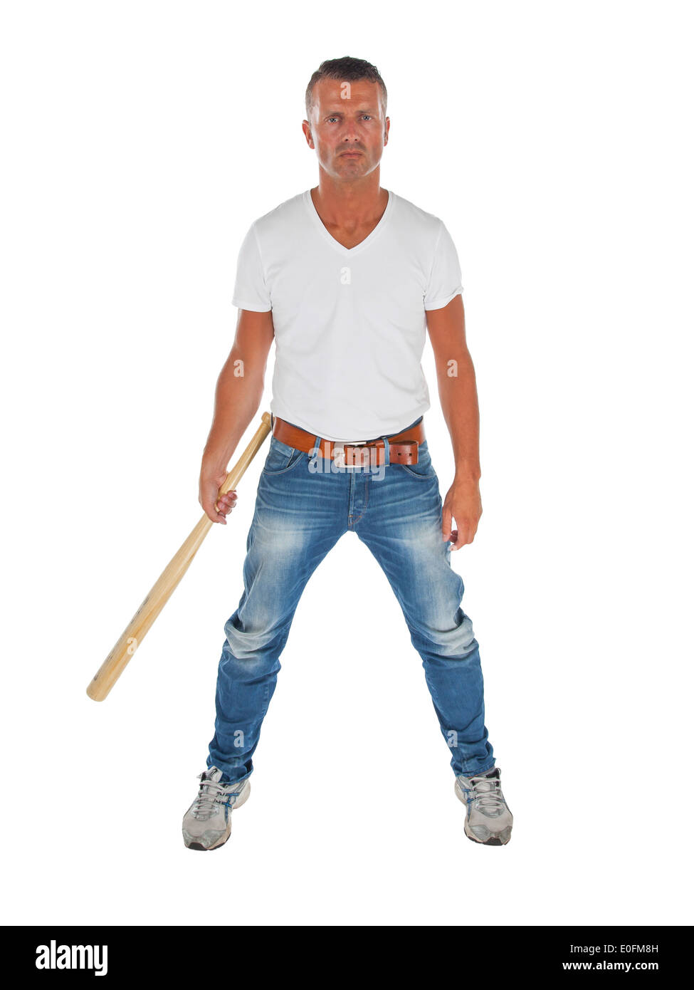 Angry looking man with bat, isolated on a white background Stock Photo ...
