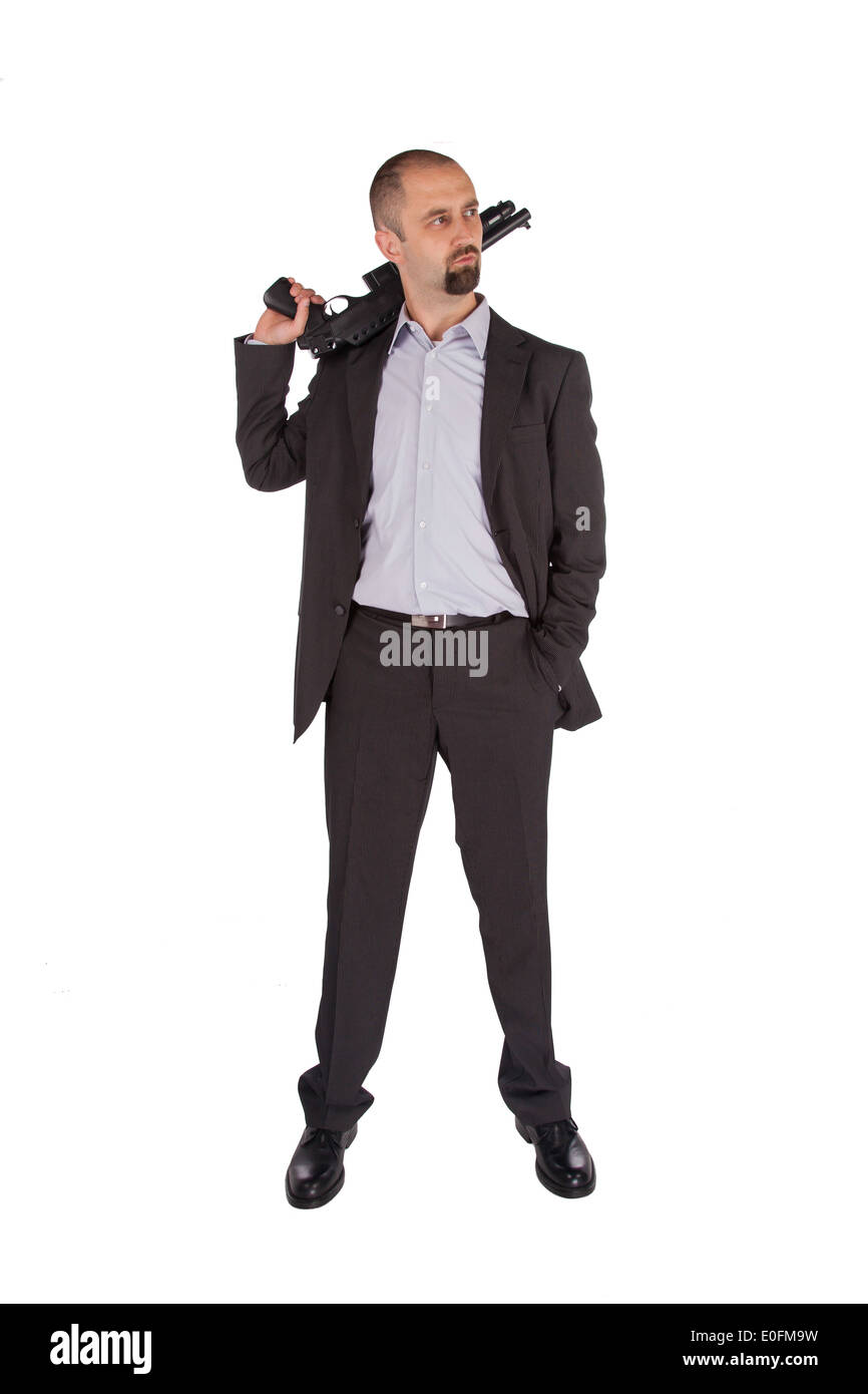 Mafia man is holding a shotgun, isolated on white Stock Photo - Alamy