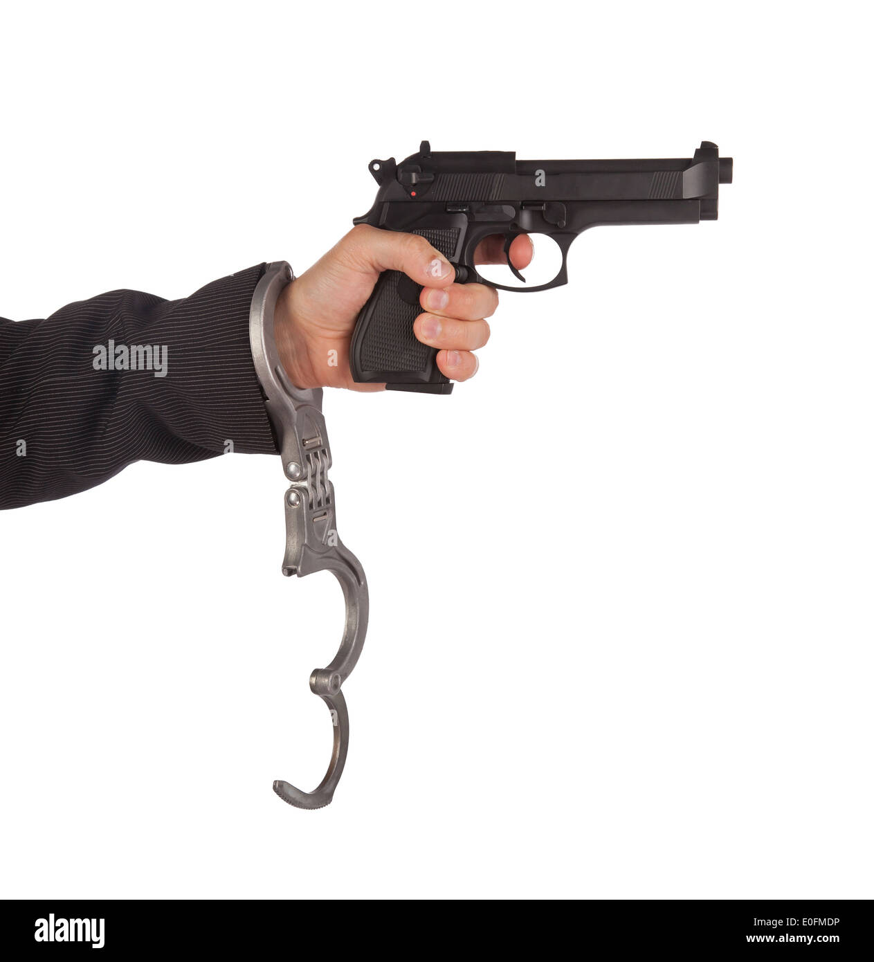 Businessman with gun and handcuffs, isolated on white Stock Photo - Alamy