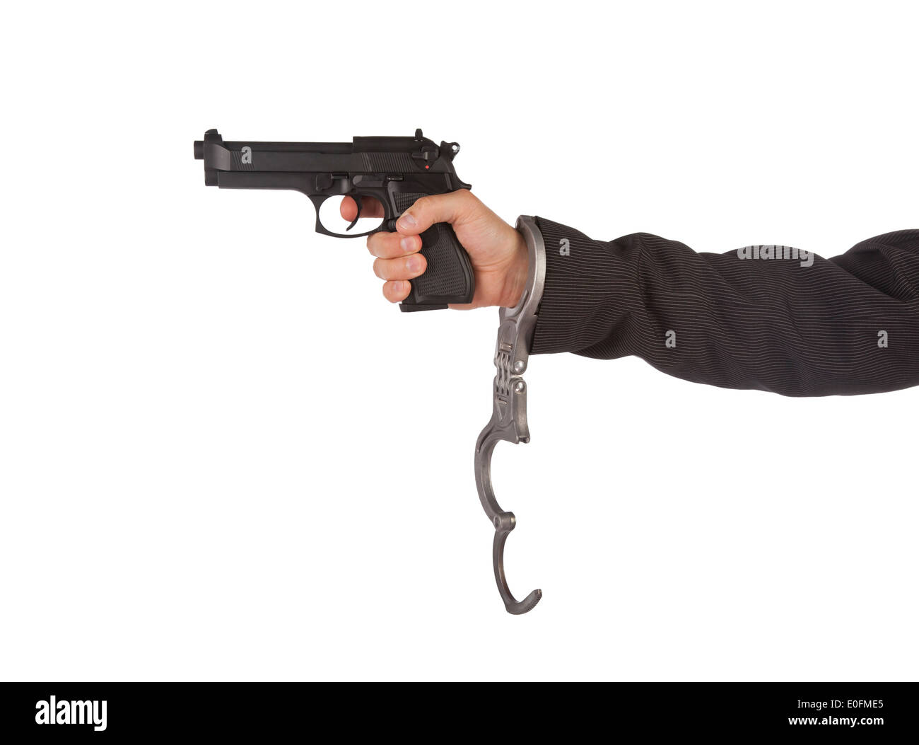 Gun handcuffs hi-res stock photography and images - Alamy