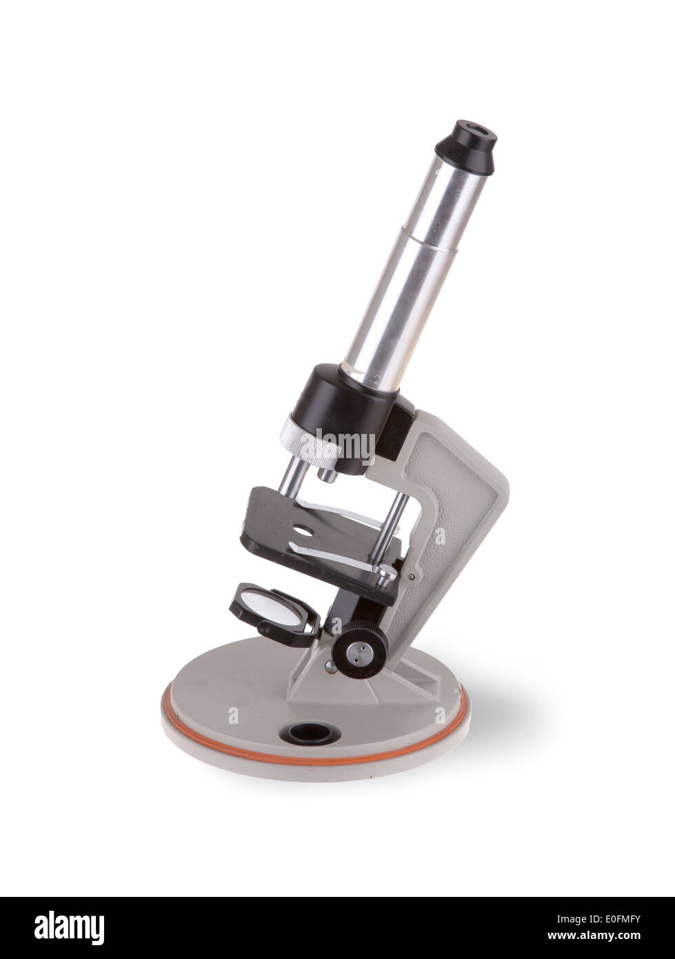 Old microscope isolated on a white background Stock Photo - Alamy