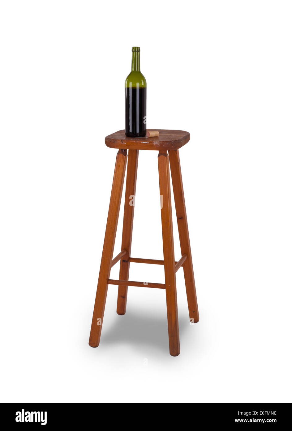 Old stool and bottle of wine isolated on white background, concept of ...