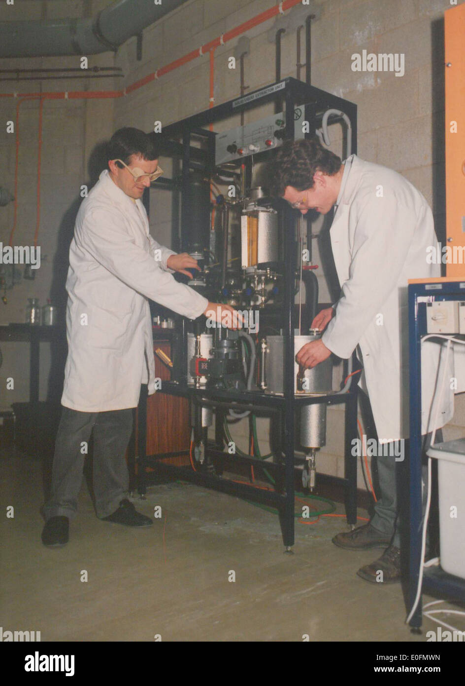 This image shows a chemistry laboratory from a historical period ...