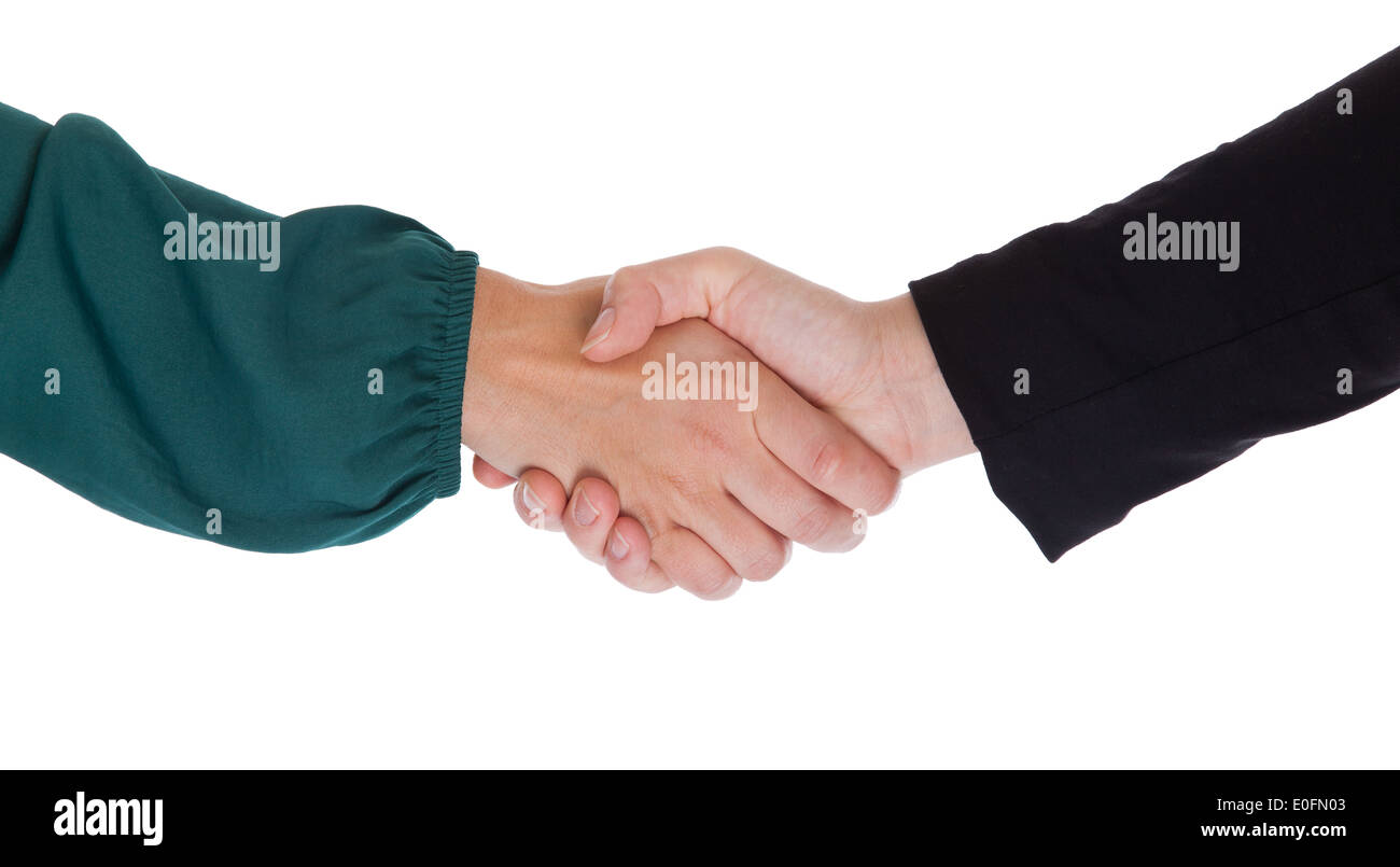 Close up of two women shaking hands, isolated on white Stock Photo - Alamy