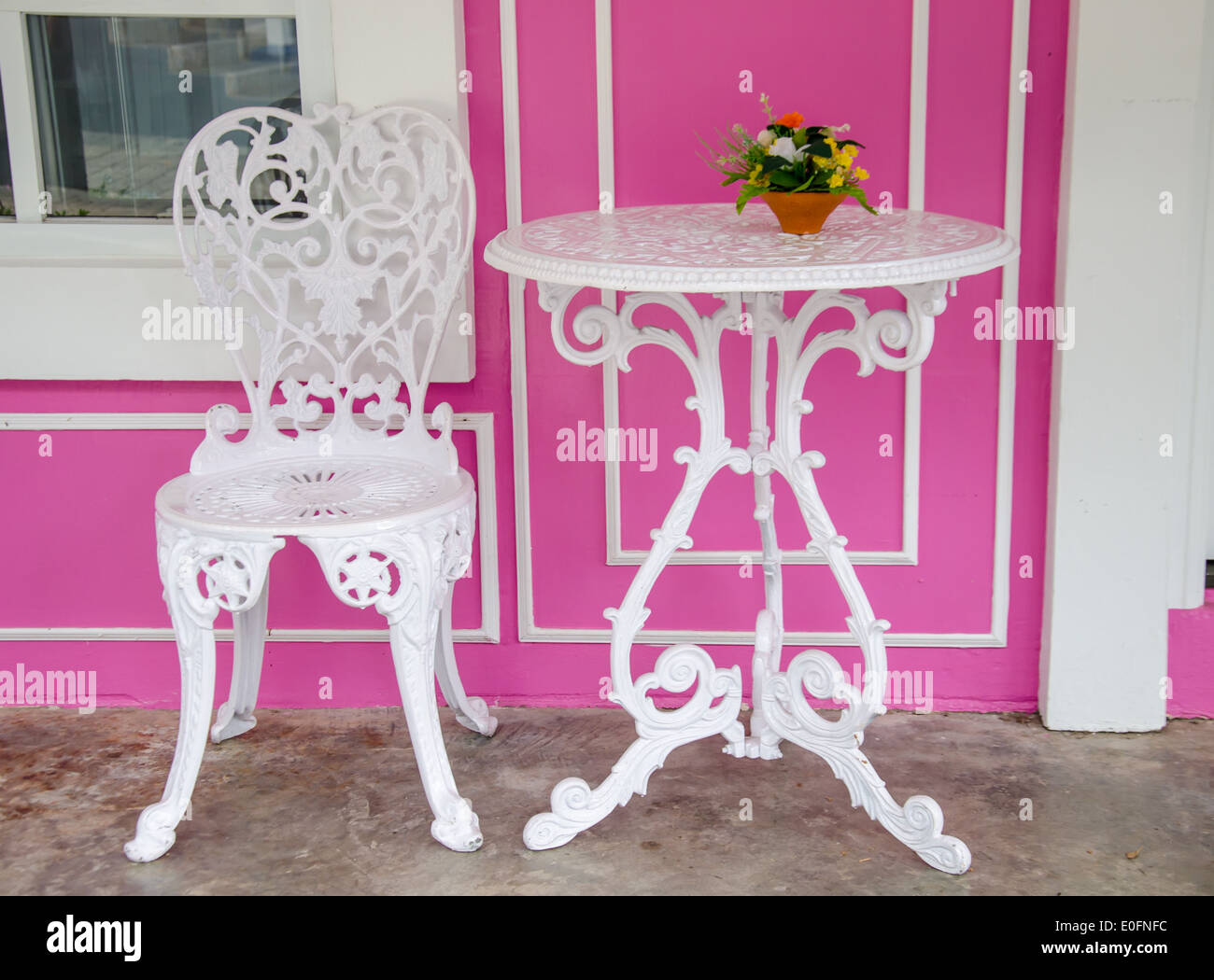 white metal chair and desk for rest and relax Stock Photo - Alamy