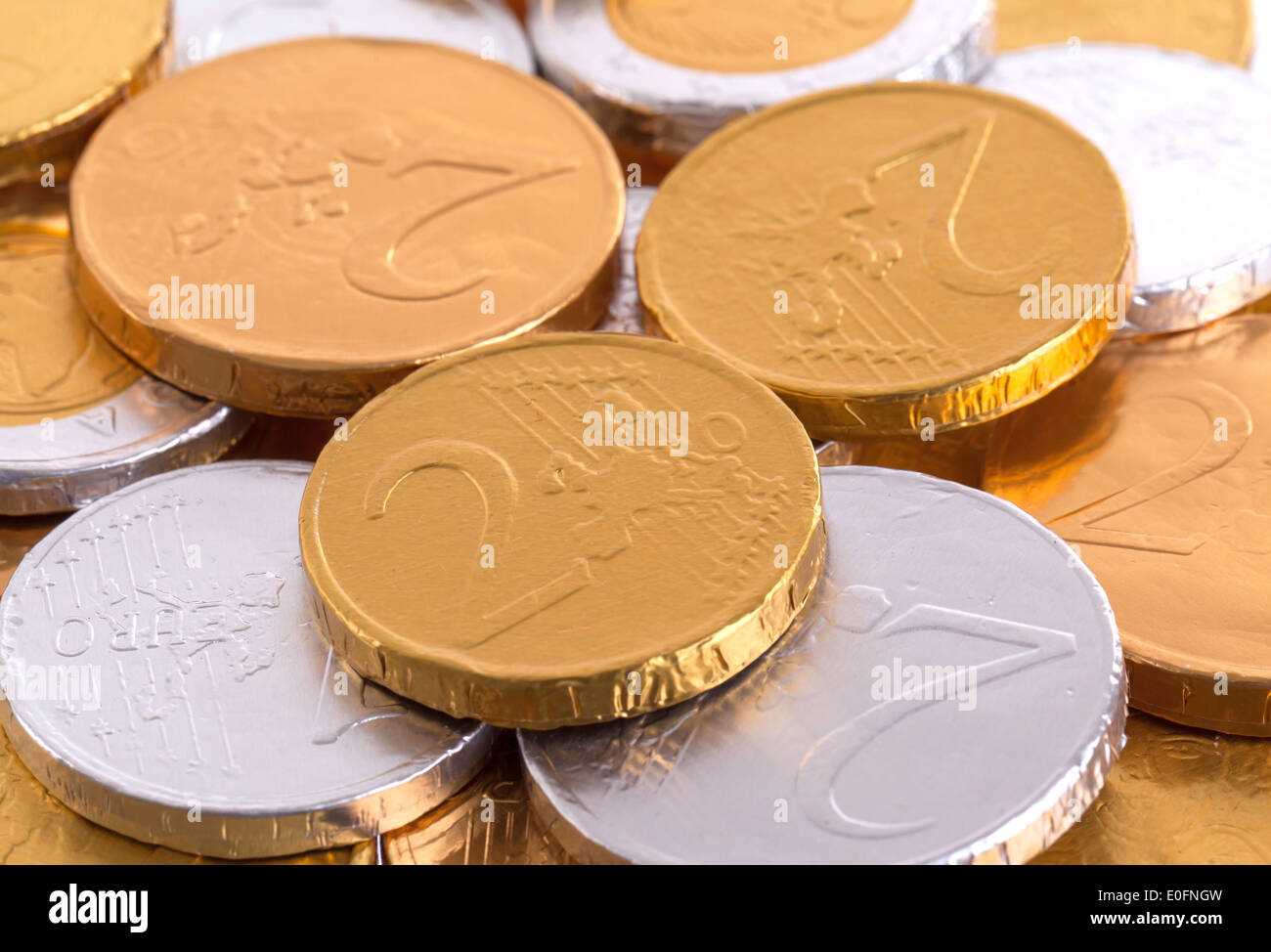 Euro currency, chocolate coins, isolated on white Stock Photo - Alamy