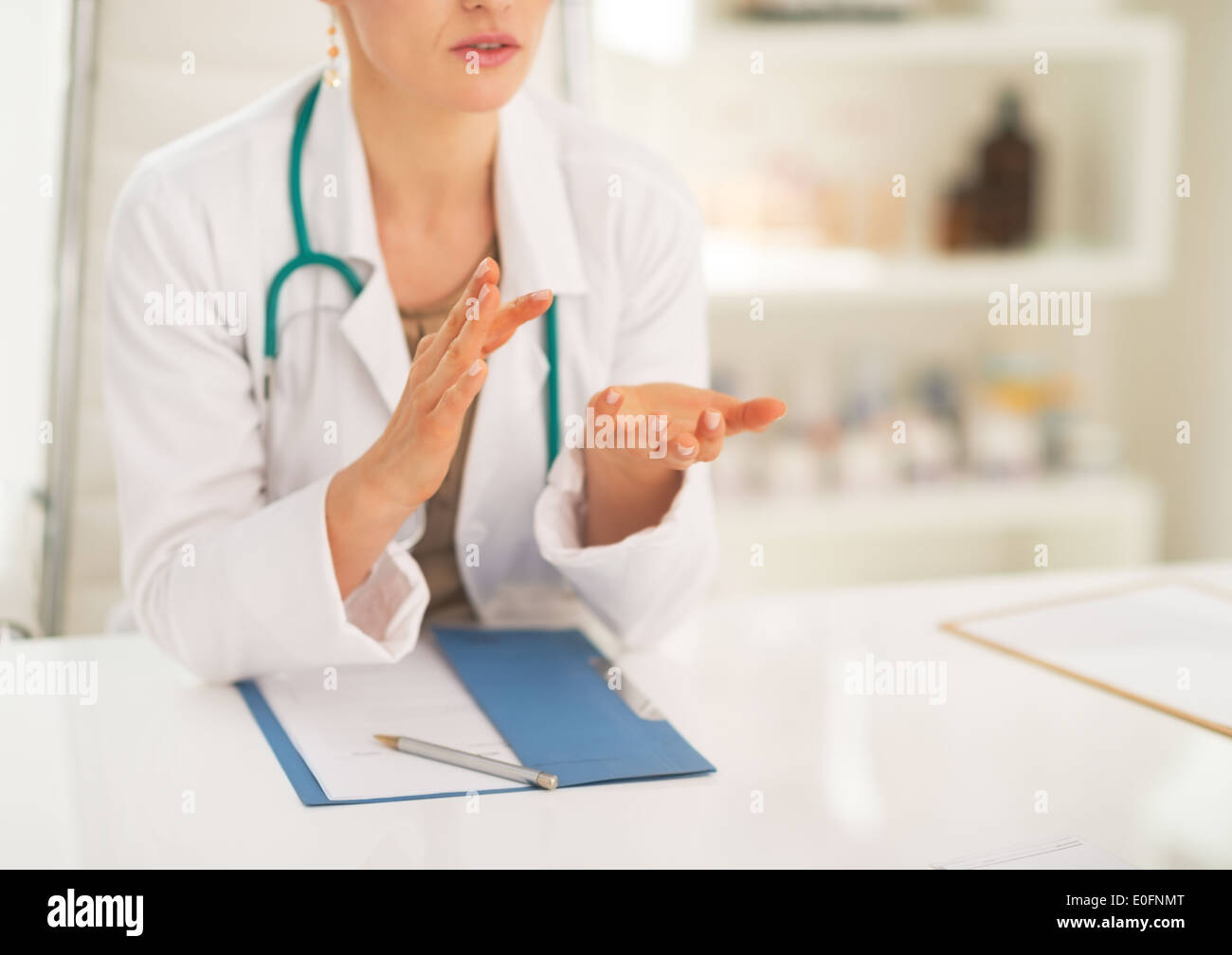 Closeup on medical doctor woman explaining something Stock Photo - Alamy