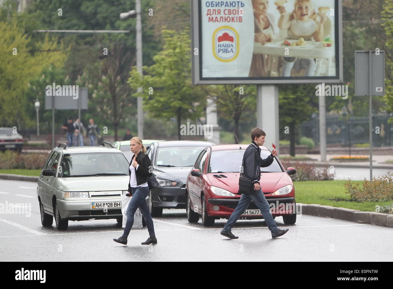 Residents walk past street hi-res stock photography and images - Alamy