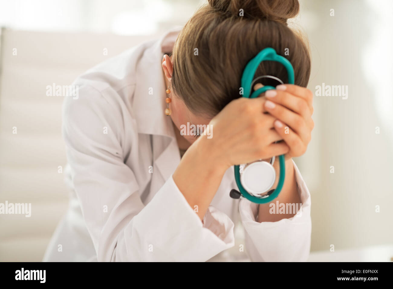 Stressed medical doctor woman in office Stock Photo - Alamy