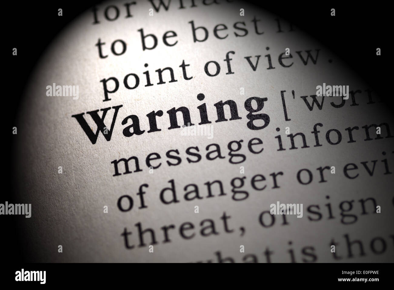Fake Dictionary, Dictionary definition of the word Warning Stock Photo ...