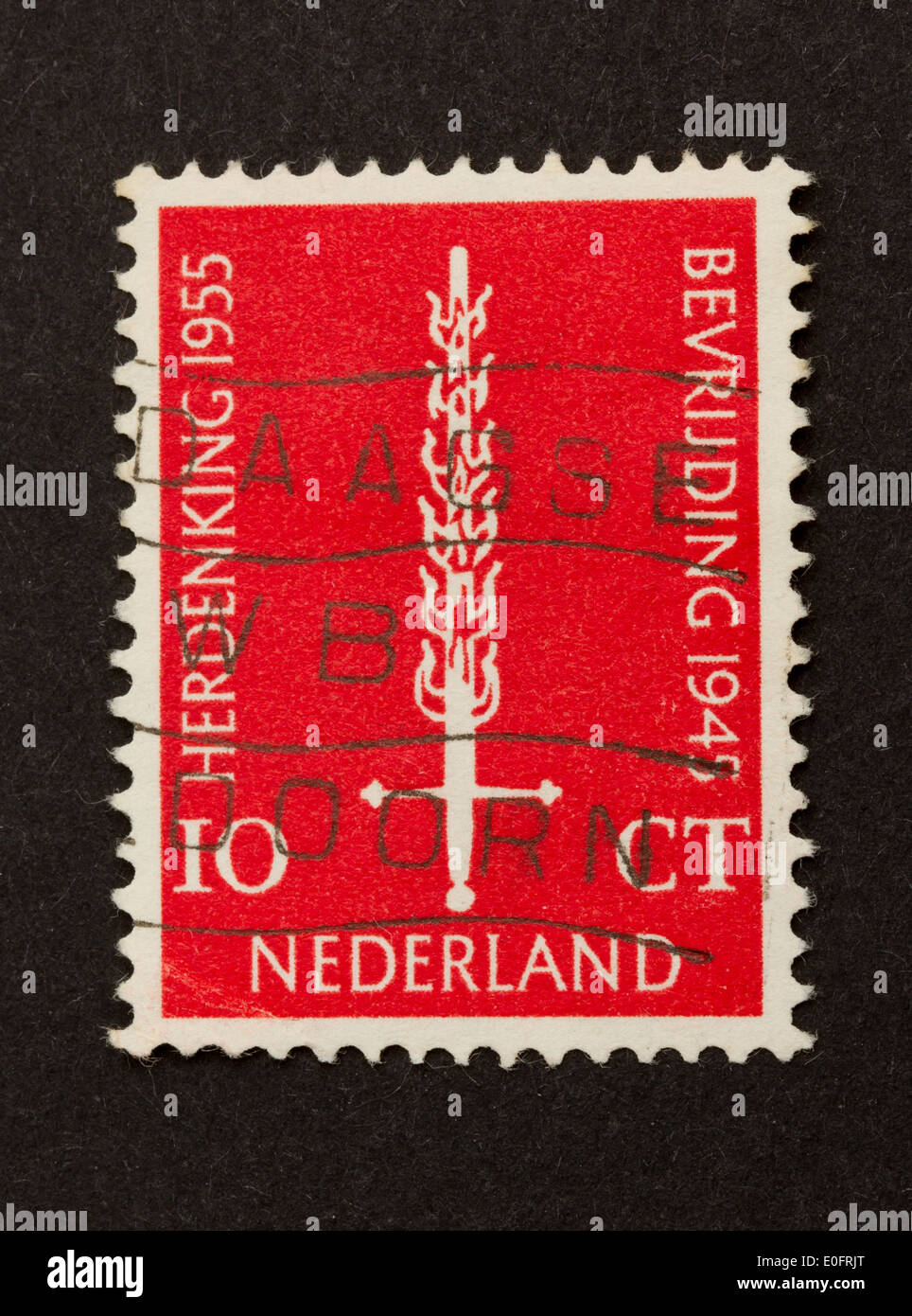 HOLLAND - CIRCA 1950: Stamp printed in the Netherlands shows a burning ...