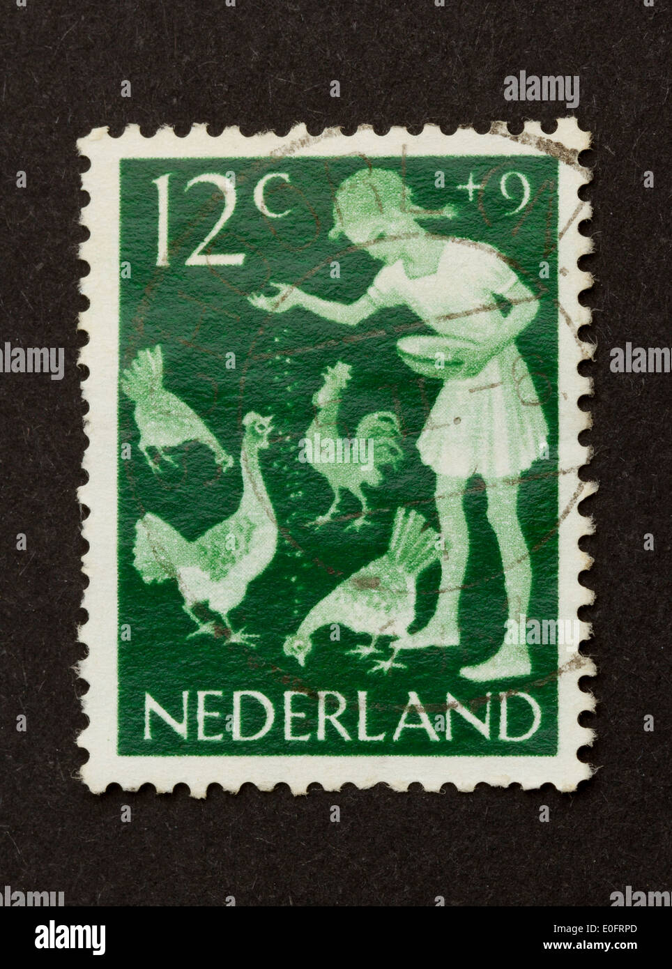 HOLLAND - CIRCA 1950: Stamp printed in the Netherlands shows a child ...