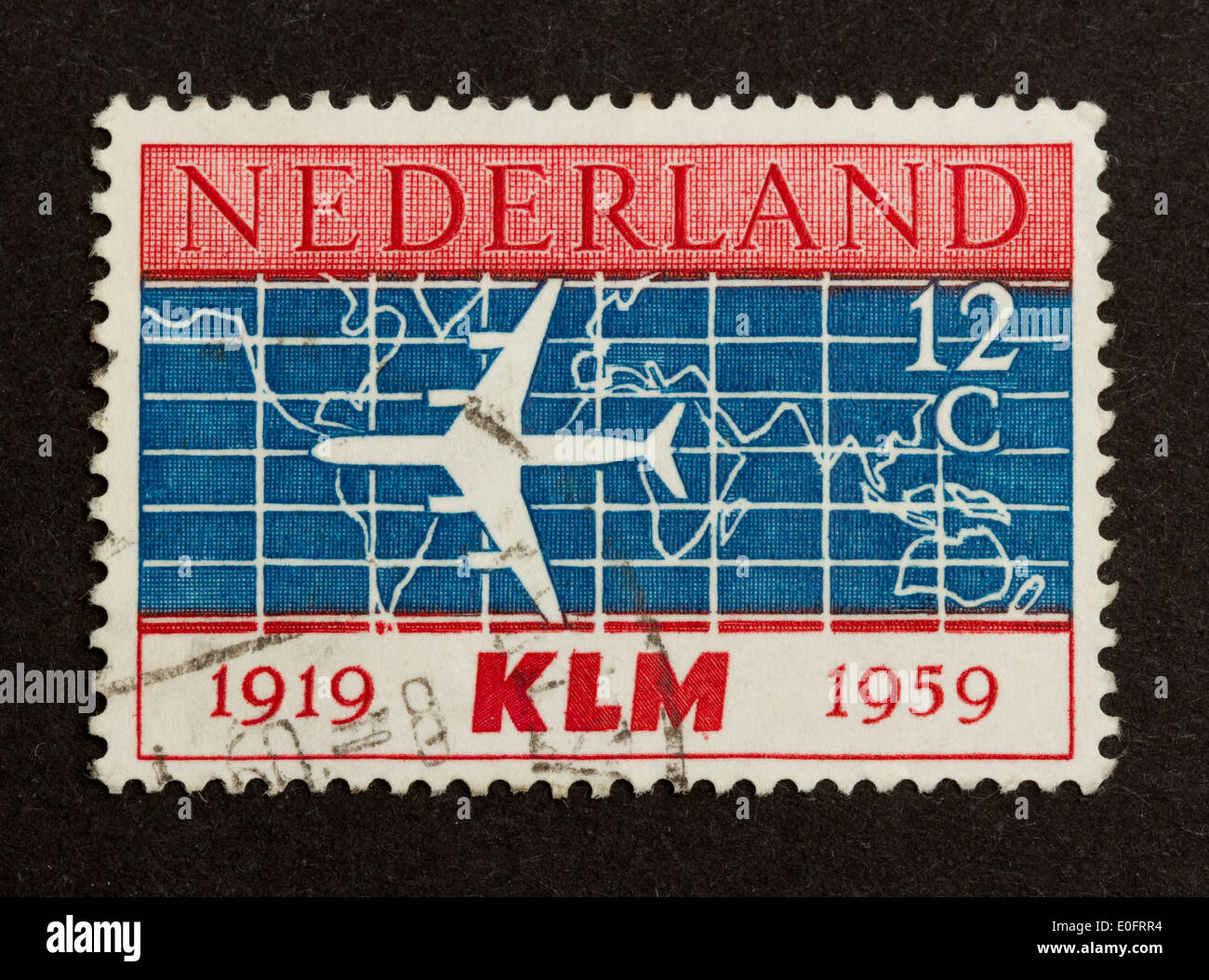 HOLLAND - CIRCA 1950: Stamp printed in the Netherlands shows a jet of ...