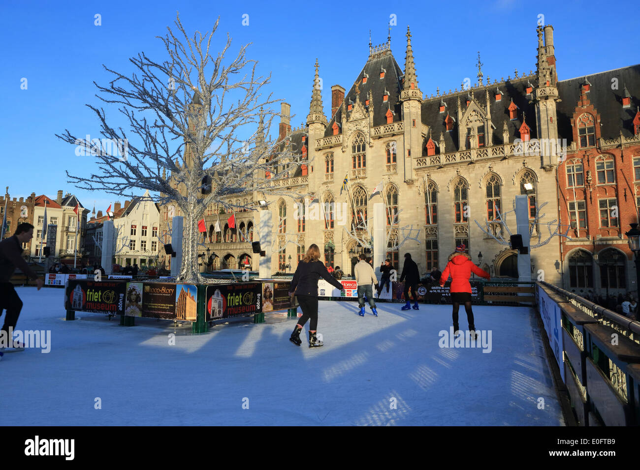 The Christmas ice rink in the Market Square in Bruges, West Flanders ...