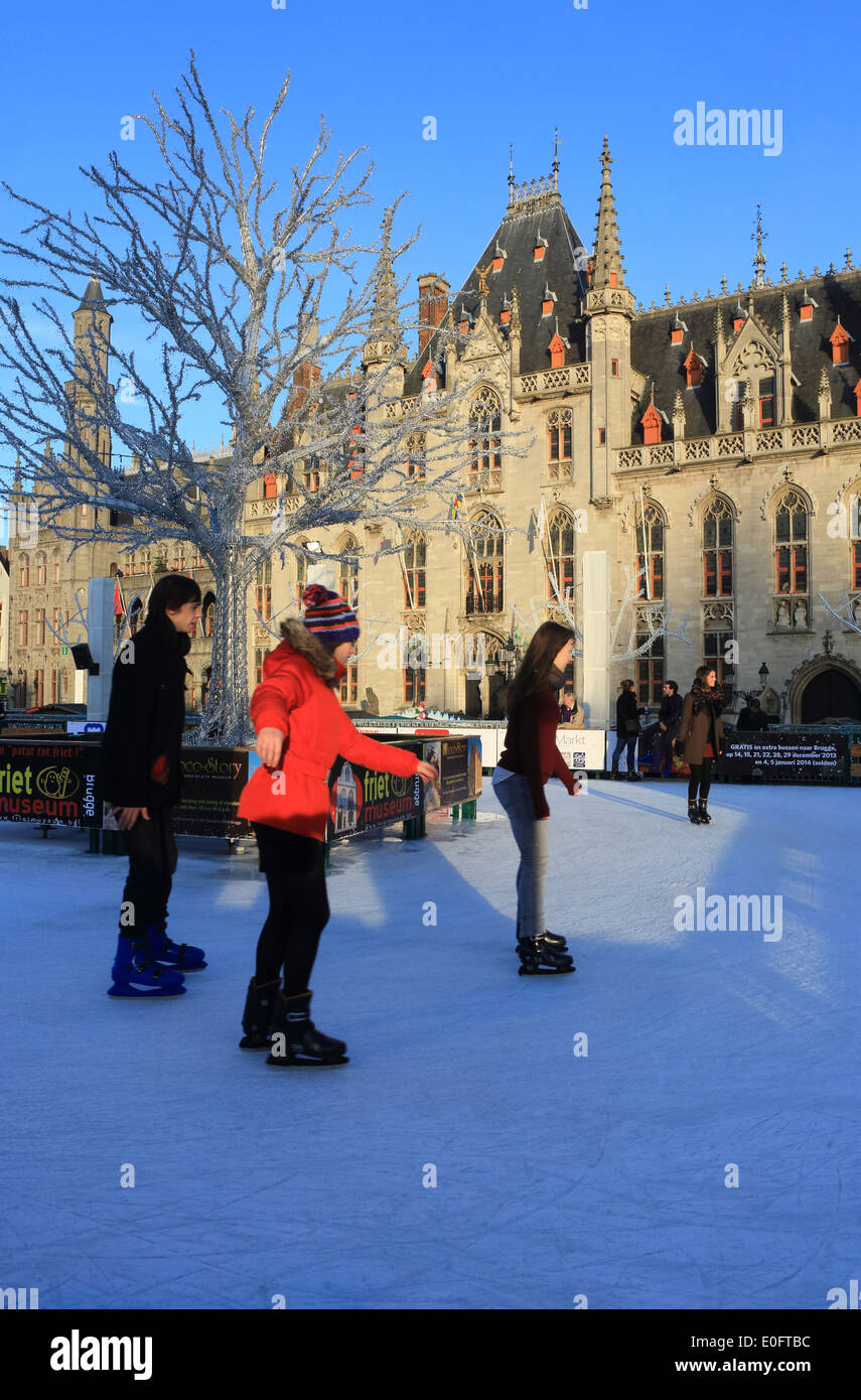 The Christmas ice rink in the Market Square in Bruges, West Flanders ...