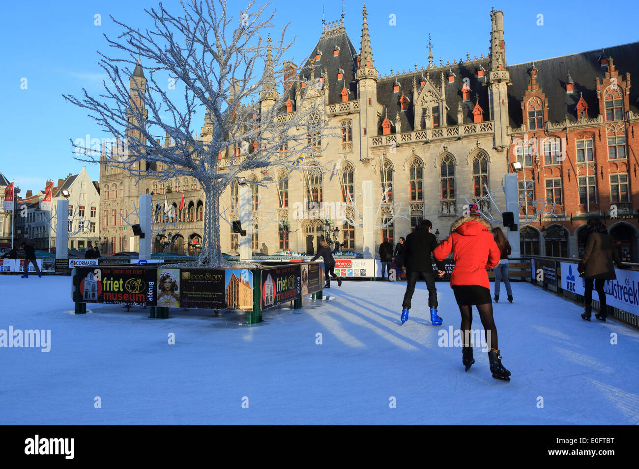 The Christmas ice rink in the Market Square in Bruges, West Flanders ...