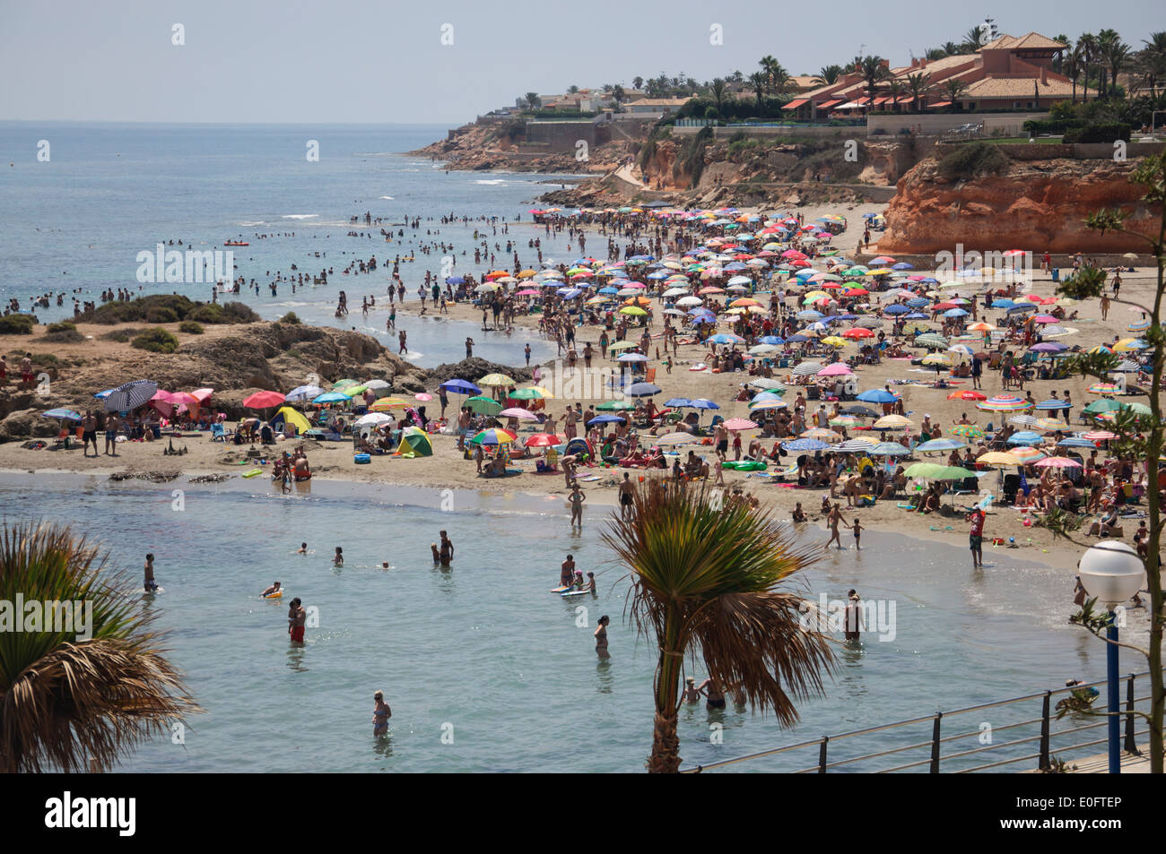 Packed beach in spain hi-res stock photography and images - Alamy