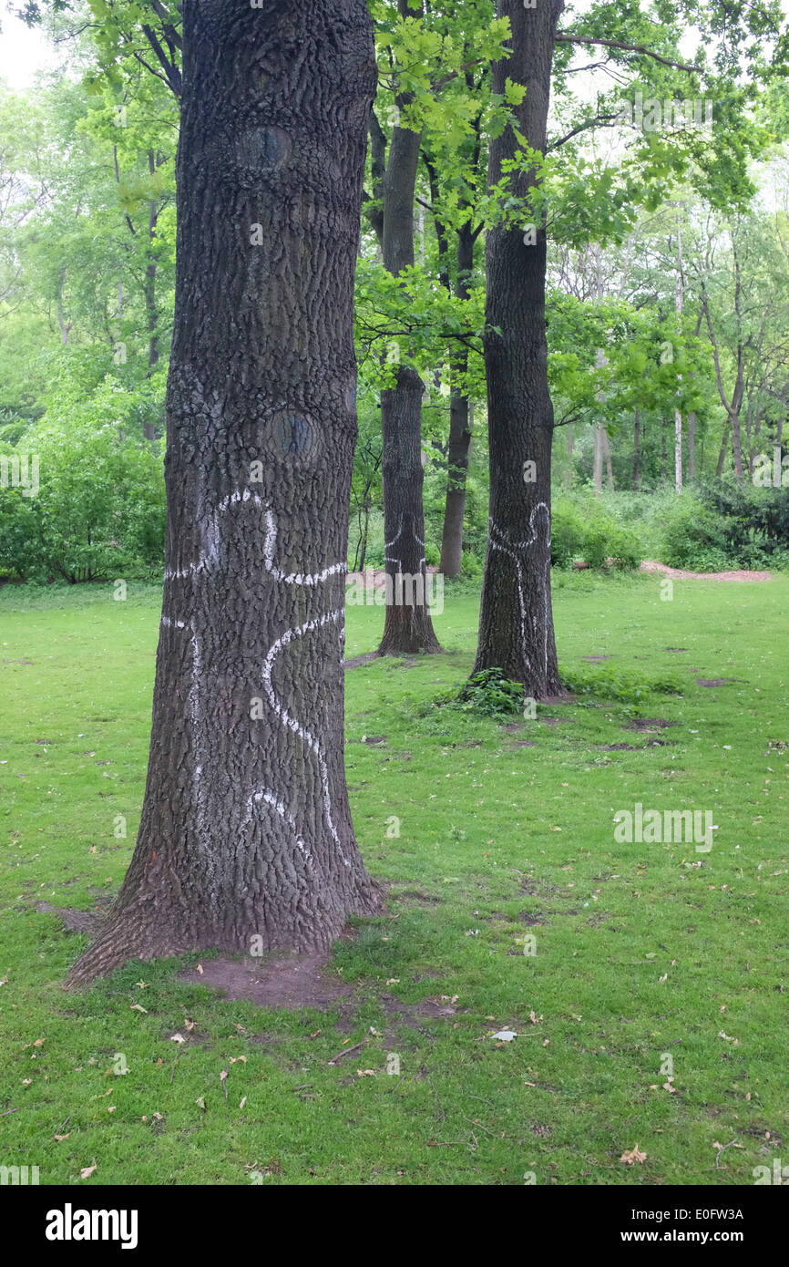 Trees with human figure outlines Tiergarten Berlin Germany Stock Photo ...