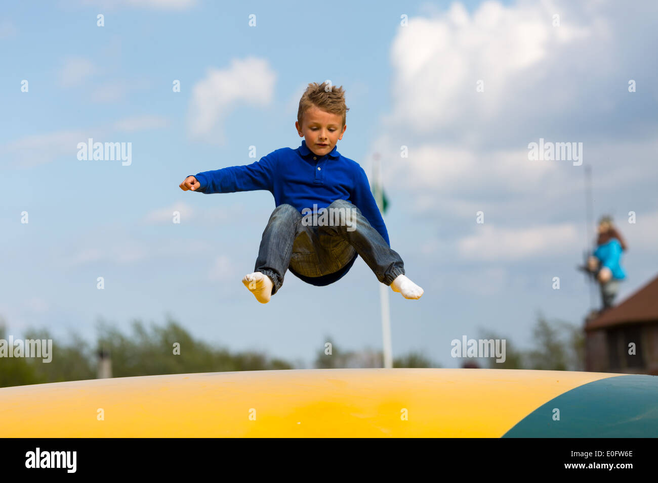 Kids jumping up and down hi-res stock photography and images - Alamy