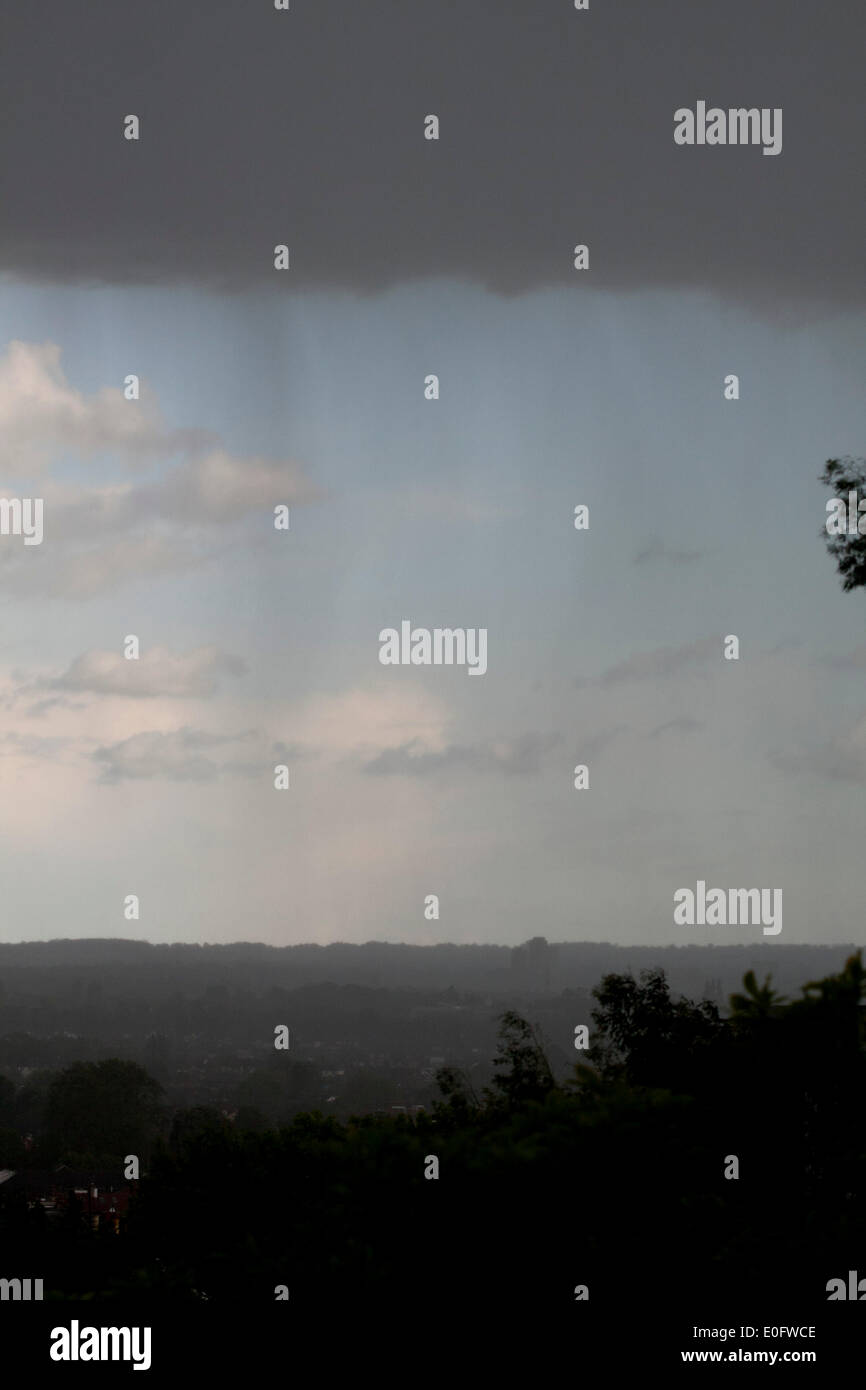 Rain falling from ominous hi-res stock photography and images - Alamy