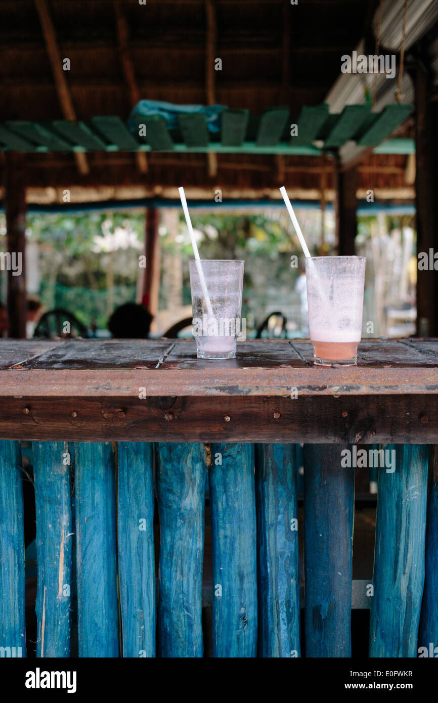 Two empty drinks at a bar in Tulum, Mexico Stock Photo - Alamy