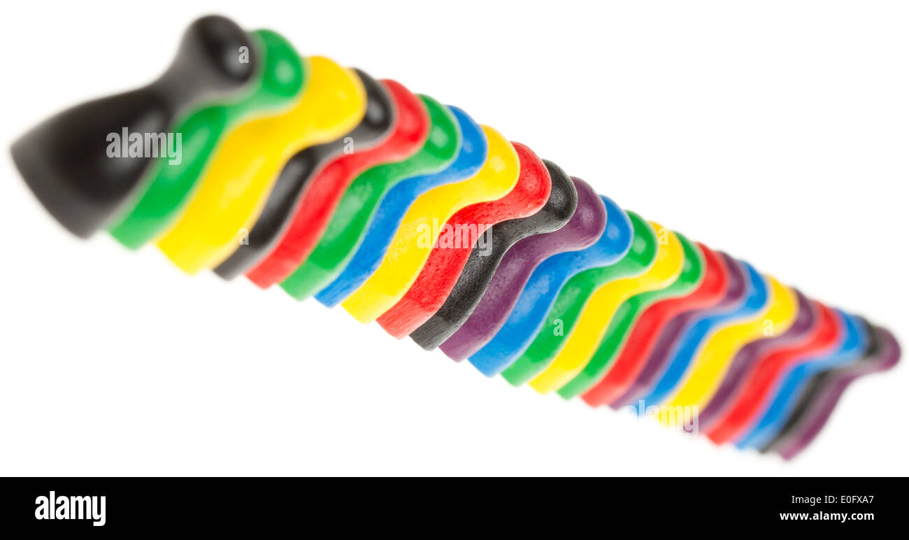 Colorful row of pawns on a white background Stock Photo - Alamy