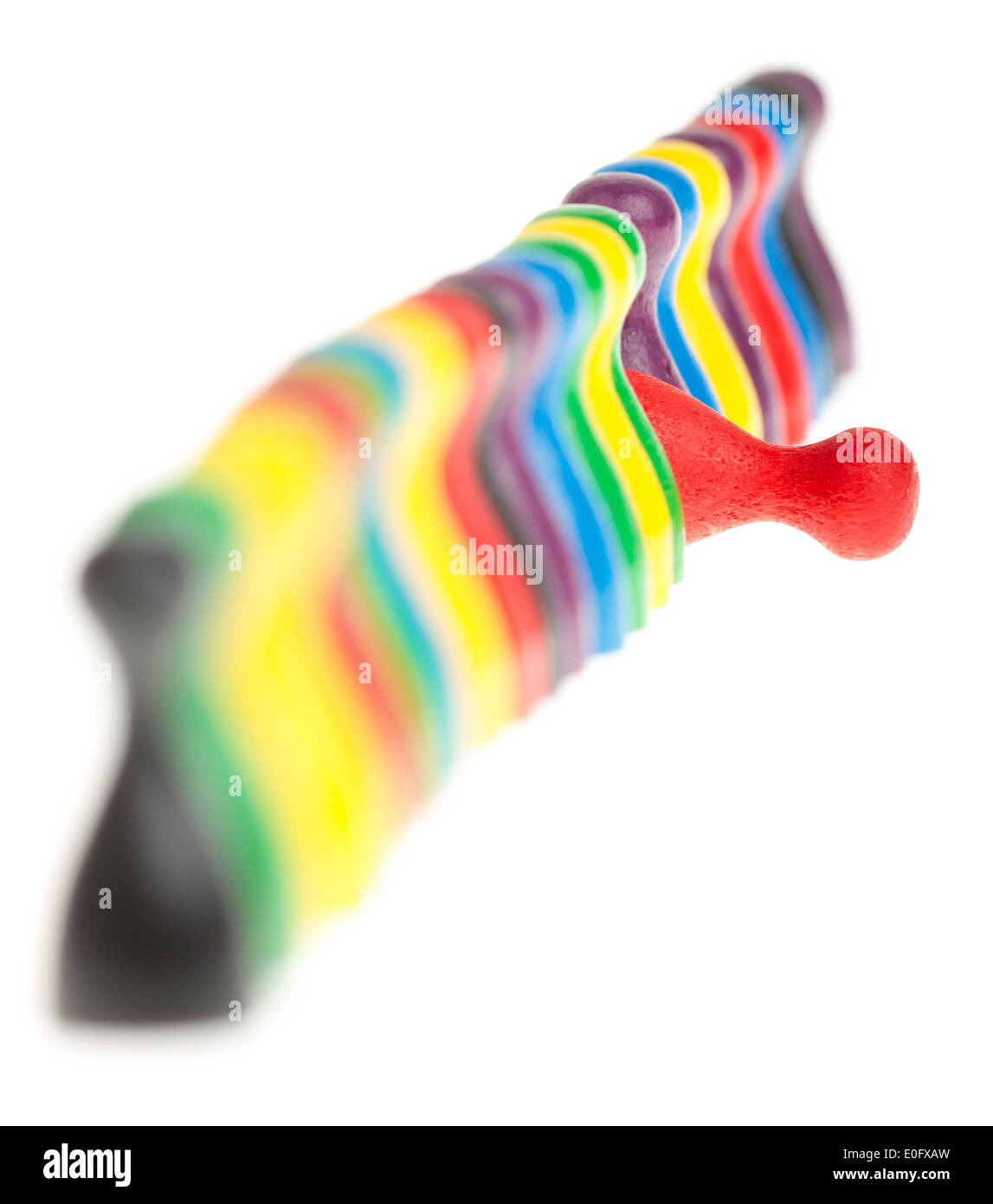 Colorful row of pawns on a white background, red pawn fallen Stock ...