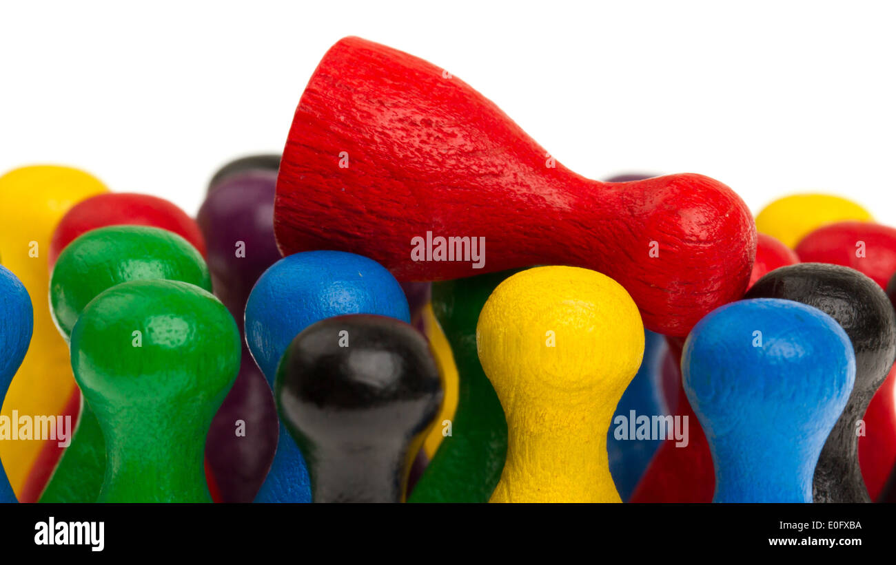 Red pawn is crowdsurfing over a collection of different colors of pawns ...