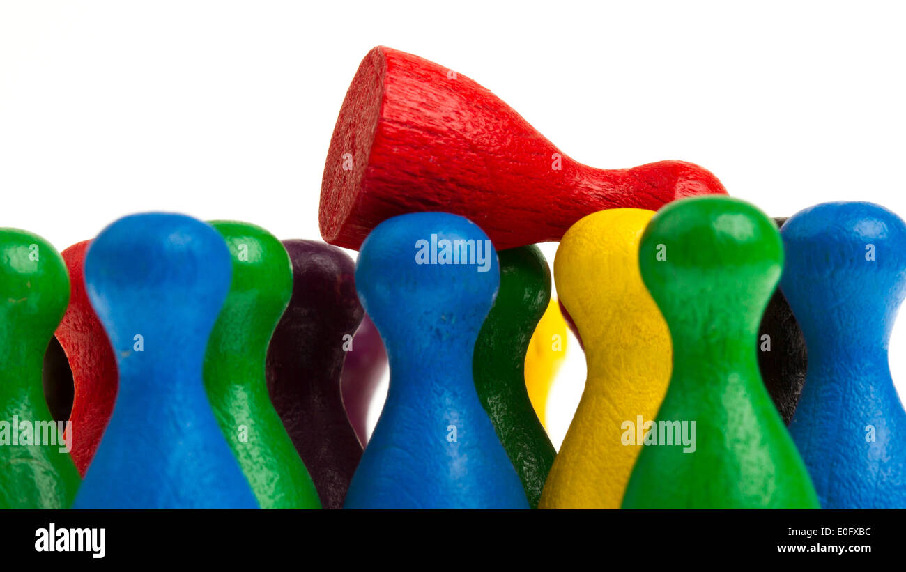 Red pawn is crowdsurfing over a collection of different colors of pawns ...