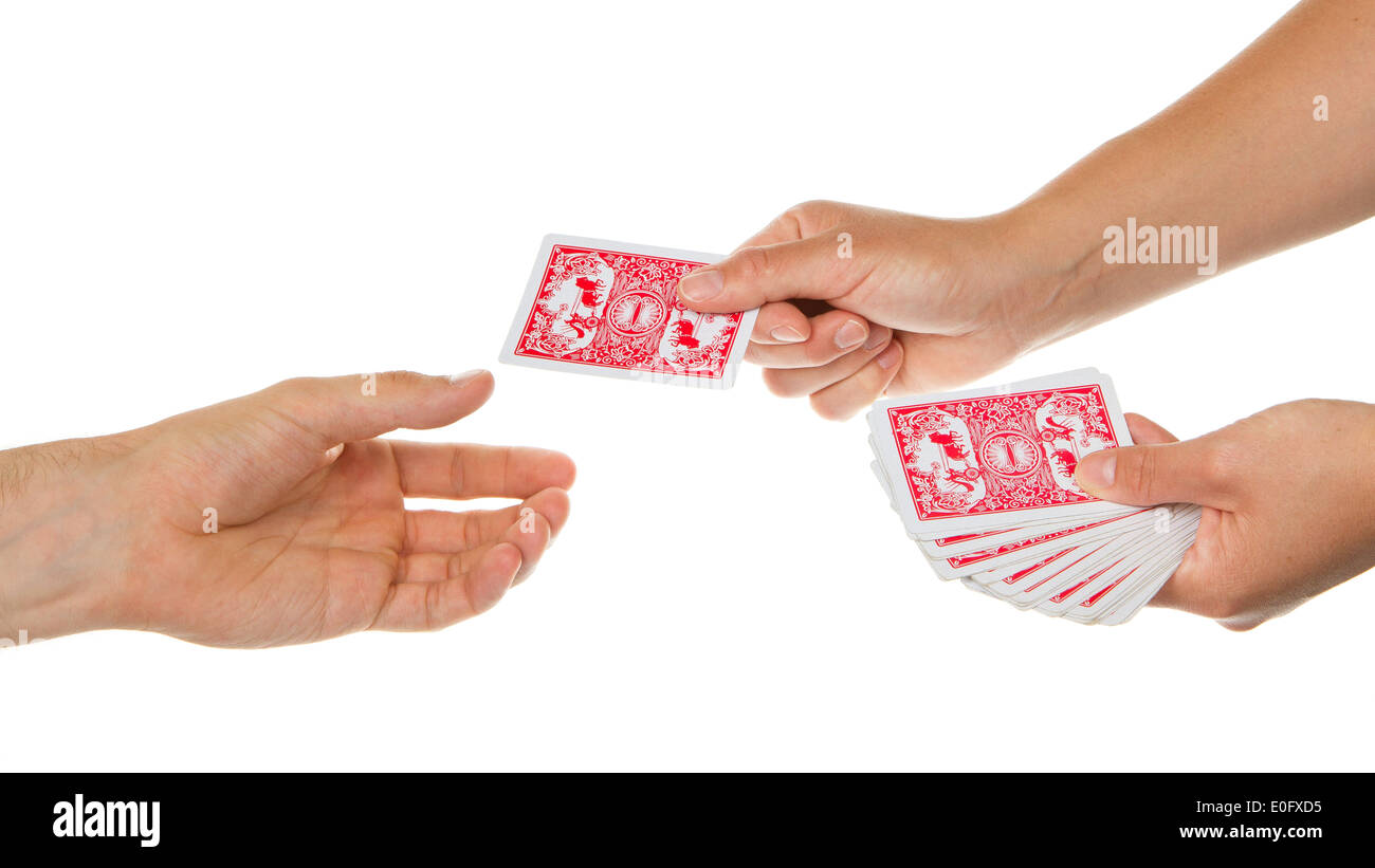 Woman giving a playing card to a man Stock Photo - Alamy