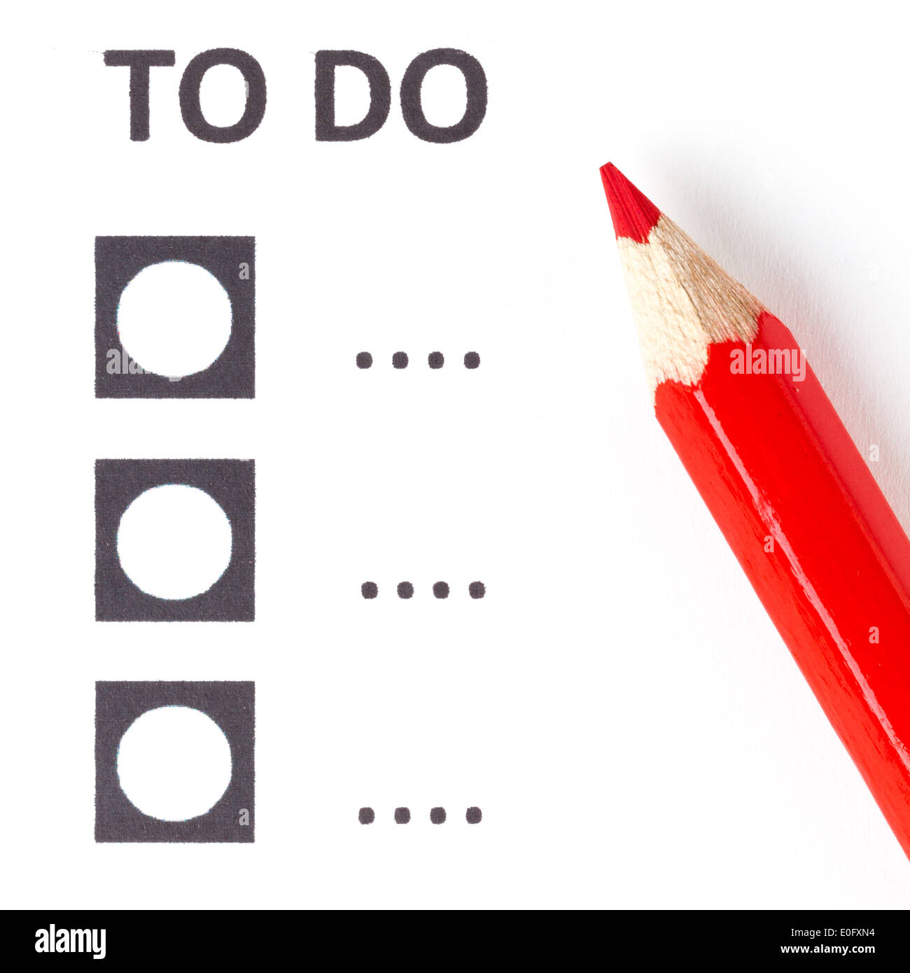 Red pencil on a voting (to do) form, isolated on white Stock Photo - Alamy