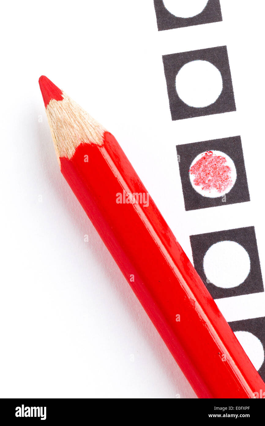 Red pencil on a voting form, isolated on white Stock Photo - Alamy