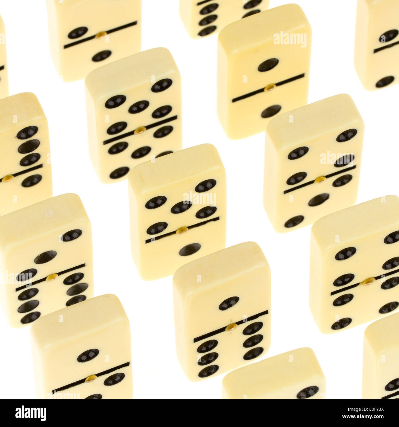 Domino pieces line isolated on white background Stock Photo - Alamy