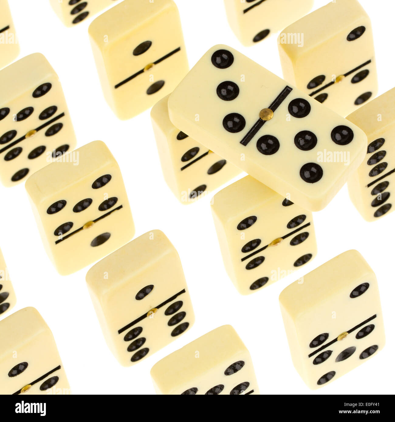 Domino pieces line isolated on white background Stock Photo - Alamy