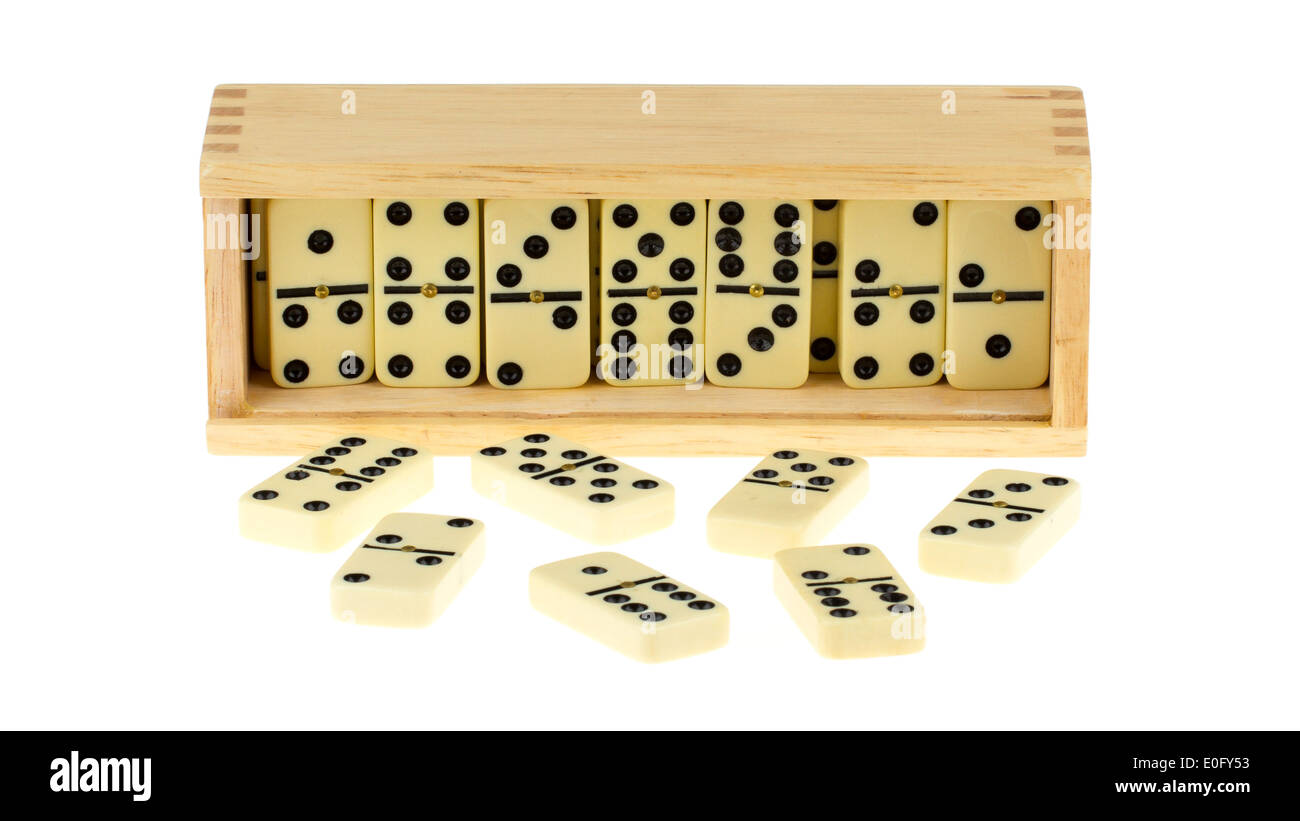 Domino in wooden box against the white background Stock Photo - Alamy