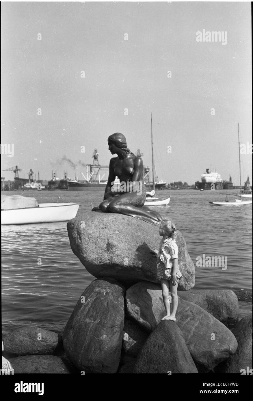 This photograph features the iconic Little Mermaid statue in Copenhagen ...
