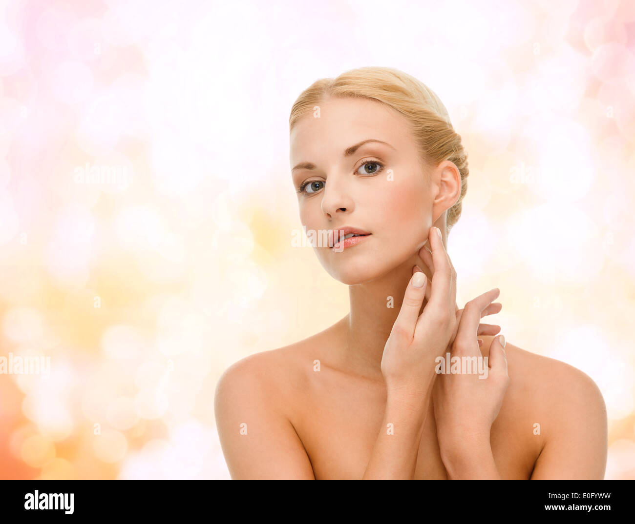 beautiful woman touching her face skin Stock Photo - Alamy