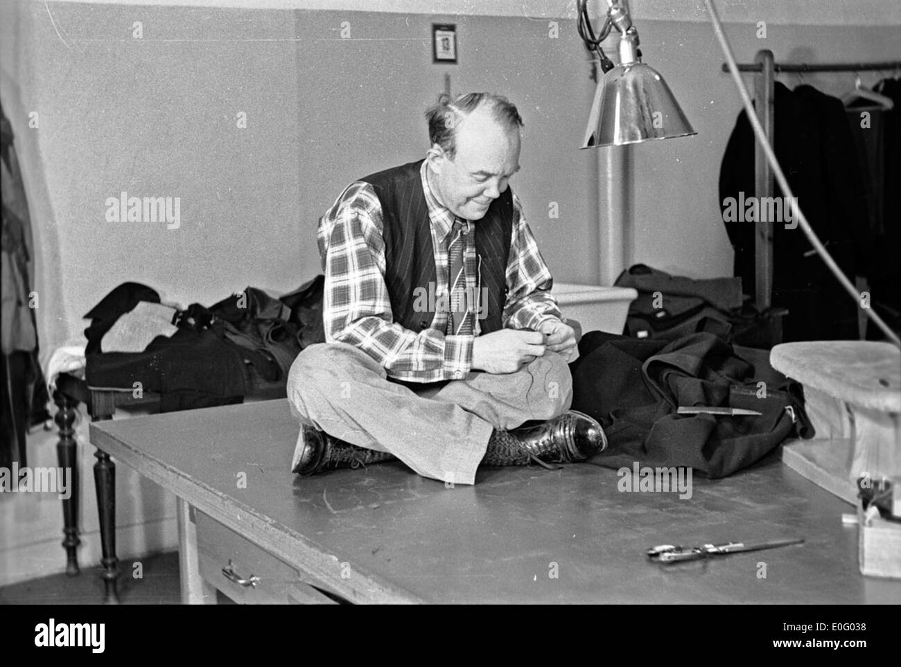 Uniform tailoring hi-res stock photography and images - Alamy