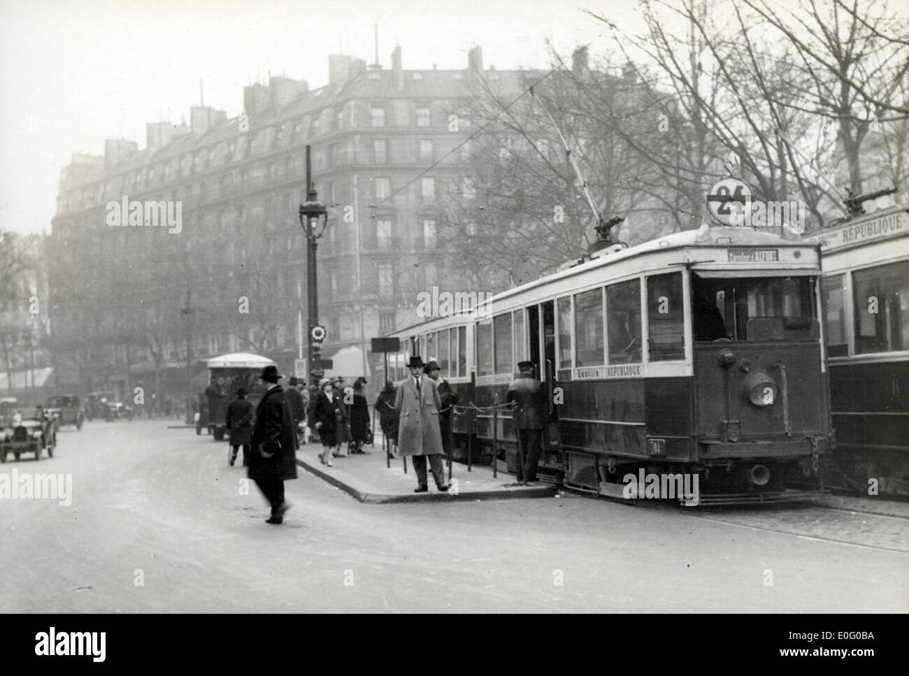 A snapshot of street traffic in Paris in 1927, showcasing the vehicles ...