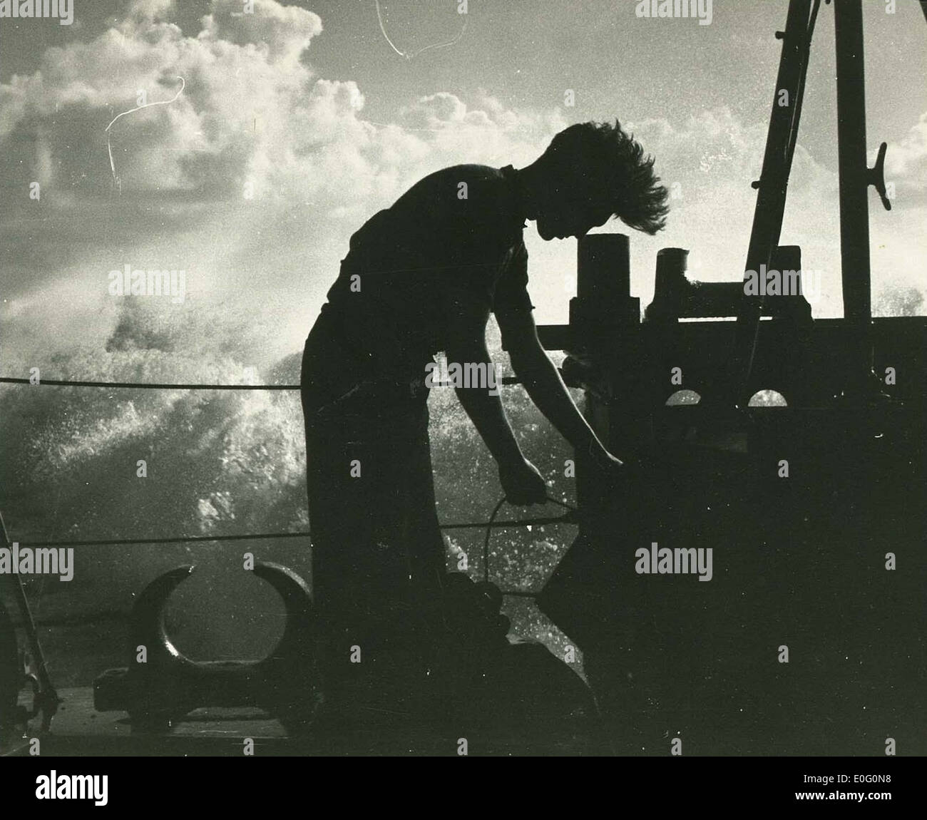 A historic image showcasing the work of individuals in a mining ...