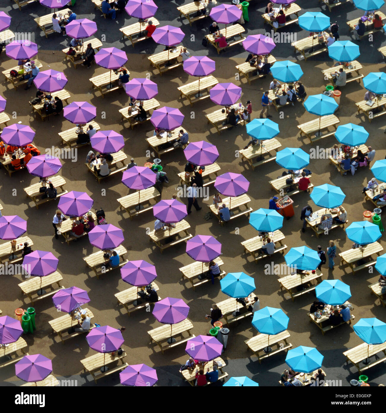 Aerial view looking down on colourful parasols shade for people at ...