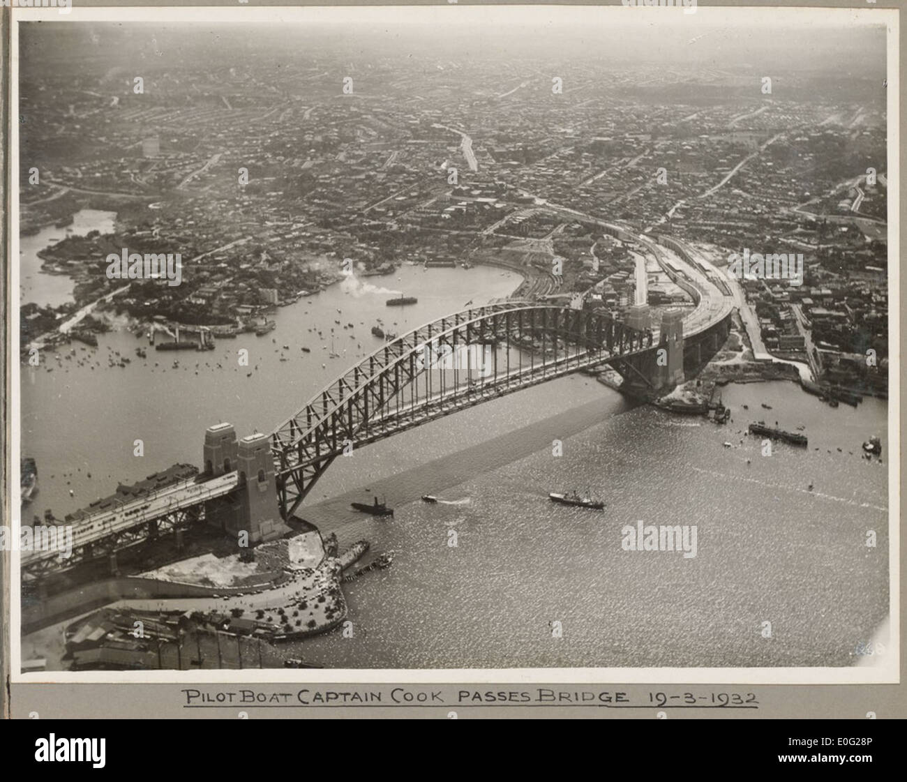 Pilot boat Captain Cook passing under Sydney Harbour Bridge, 19 March ...
