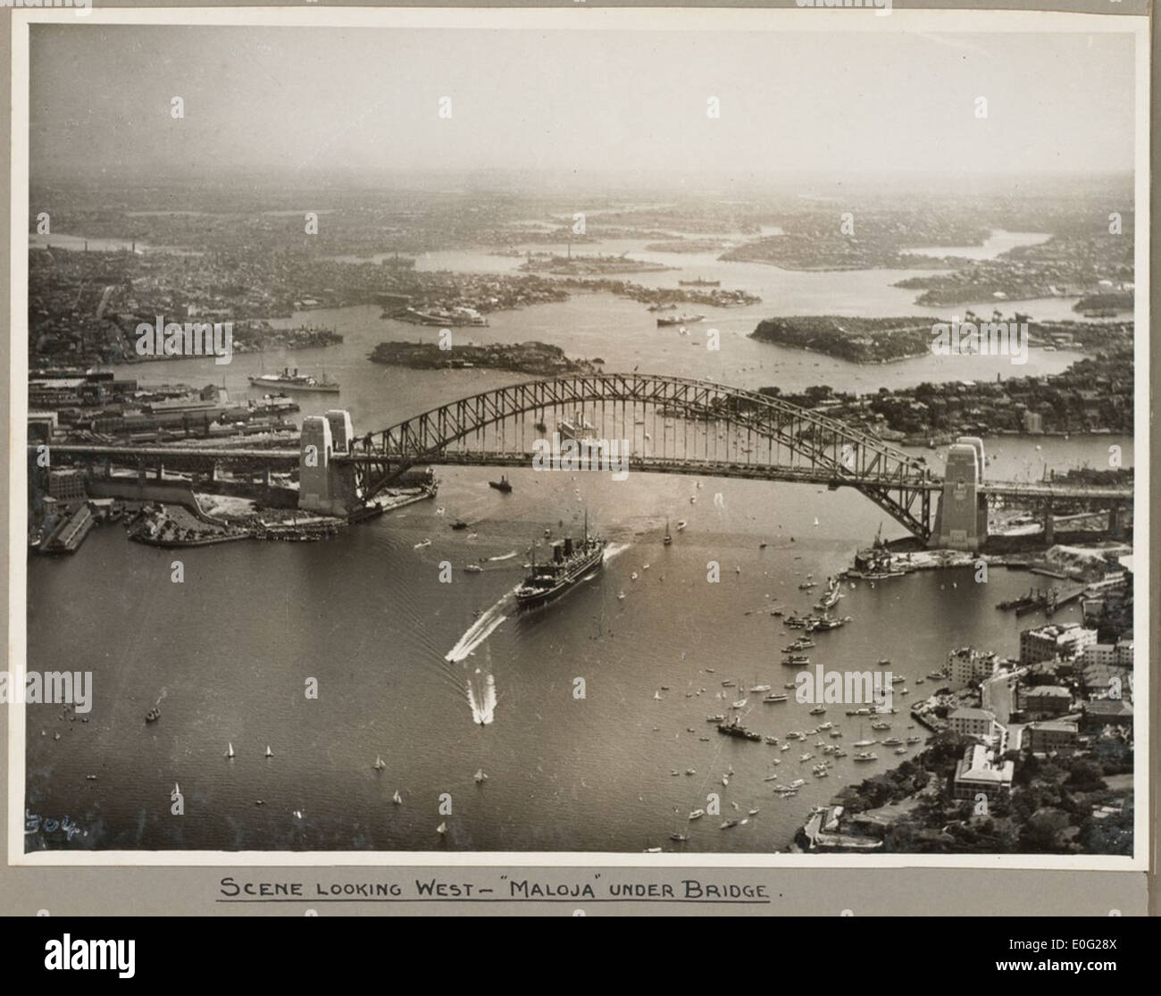 The RMS Maloja, an armed merchant cruiser, passes beneath the Sydney ...