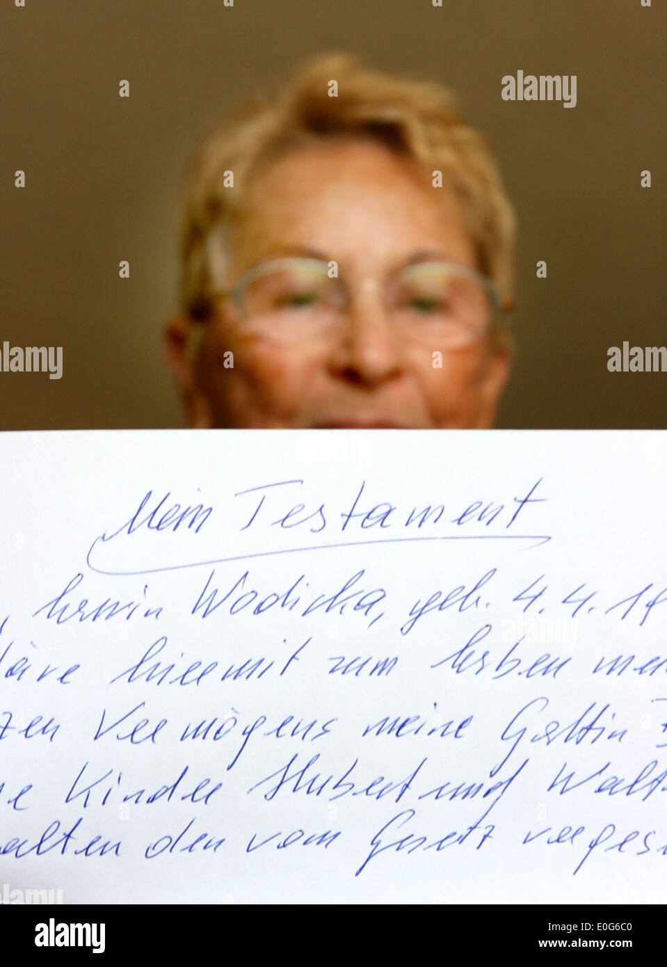 Woman with testament [], concepts, document, documents, heirs ...