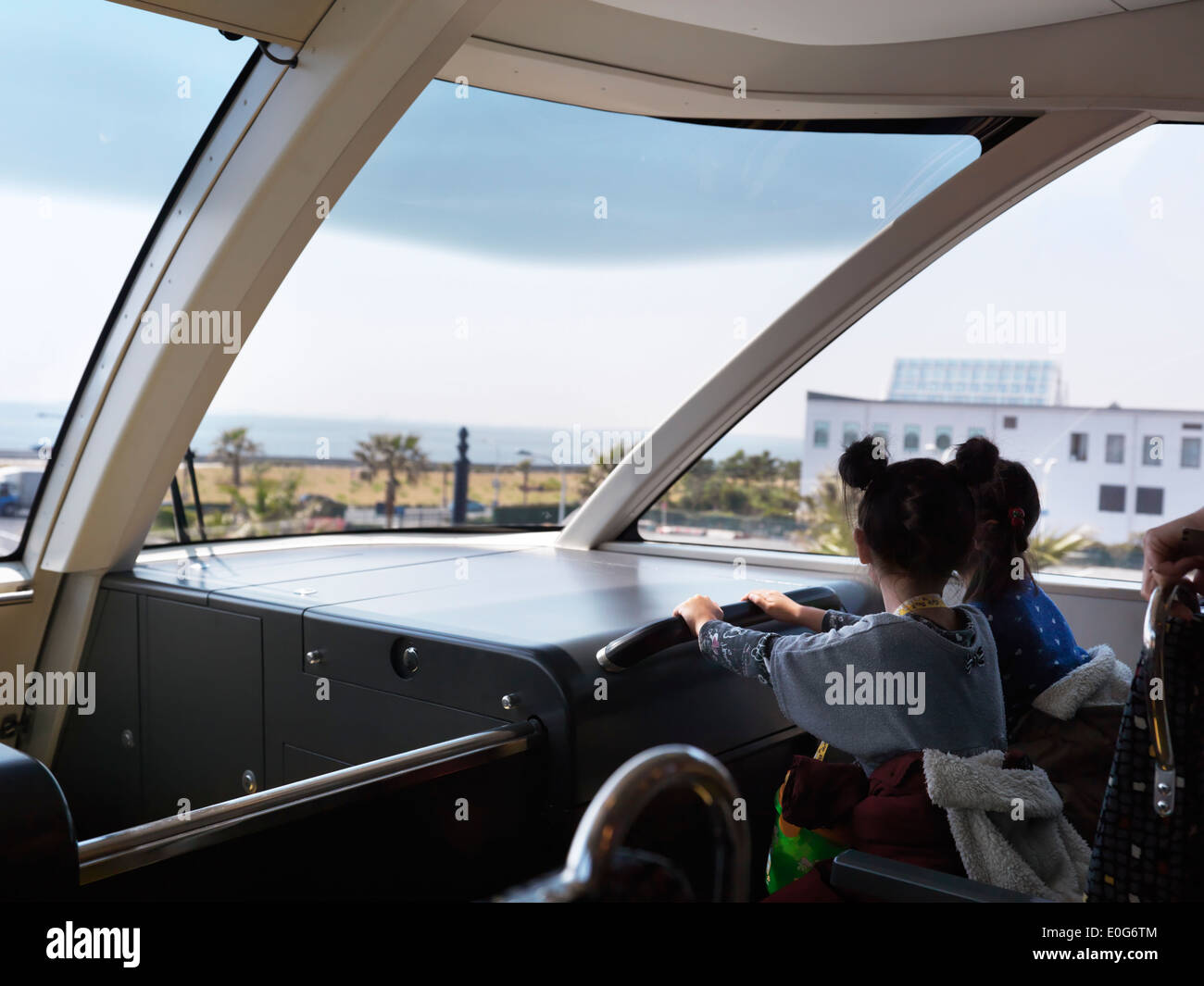Children riding Disney Resort Line monorail train at Tokyo Disneyland ...