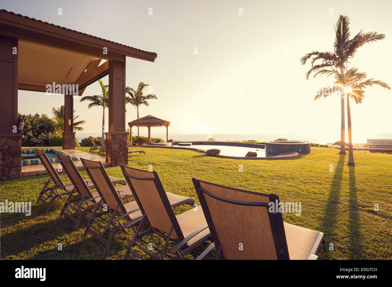 Beautiful Home Exterior Patio Deck and Lounge Chairs with Sunset View ...