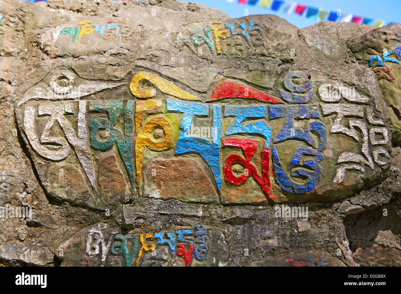 Tibetan prayer stone Stock Photo - Alamy